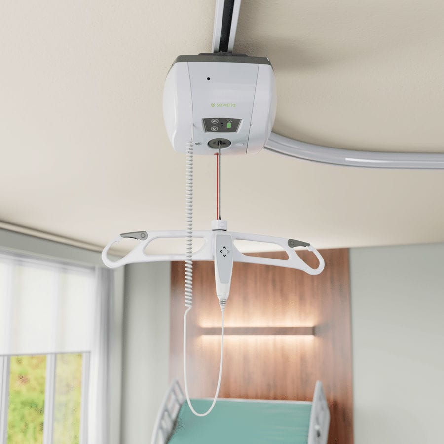 Battery-operated patient lift - M-Series Essential - Savaria - ceiling ...