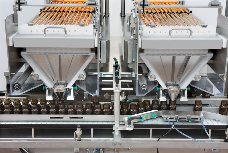 Counting machine for the pharmaceutical industry / electronic / with ...