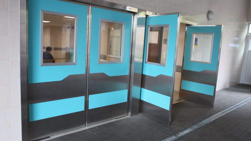 Hospital door - PENDULUM - LeoCon Group - stainless steel / aluminum ...