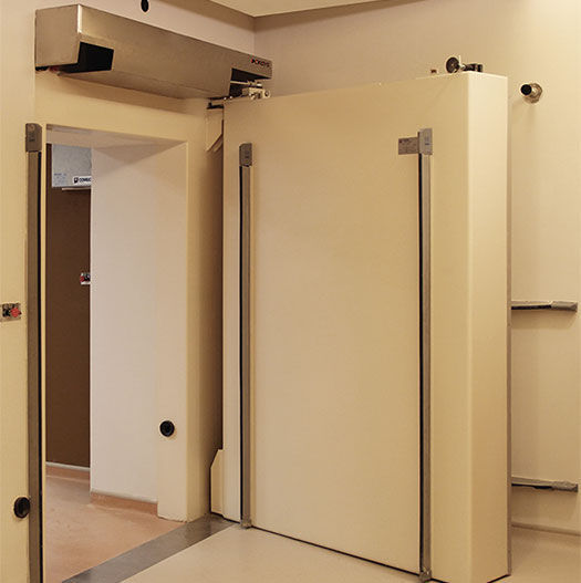 Shielded door - Woodmans Meditech - for radiation therapy / sliding