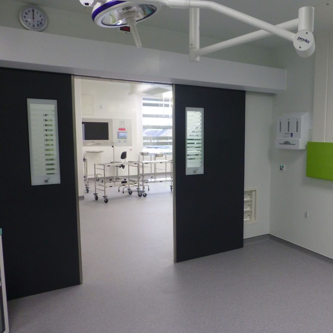 Protection door - Dortek - hospital / sliding / GRP