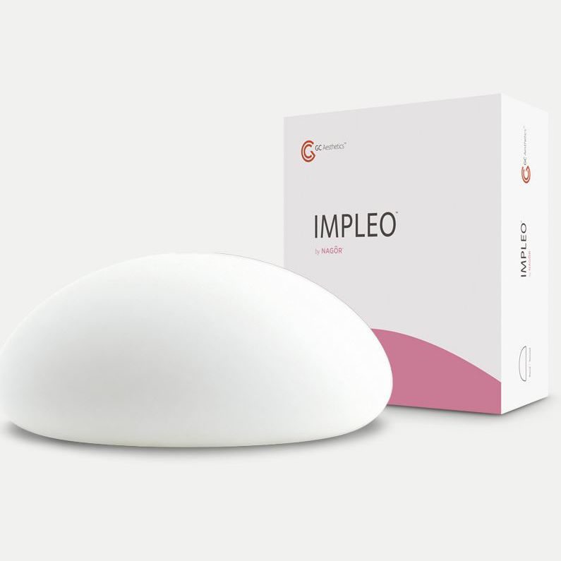 Breast implant - IMPLEO™ - GC Aesthetics - round / silicone gel / smooth