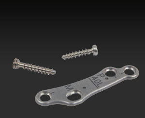 Metatarsophalangeal joint arthrodesis plate - NeoFit® - in2bones - metallic
