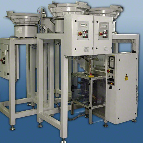 Packaging machine feeder - Toss GmbH & Co. KG Verpackungssysteme