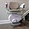 Straight staircase stairlift - K2 Plus - Savaria - for humans / rail-mounted