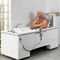 Electric medical bathtub - Malibu® - Arjo - with lift seat / with bath ...