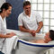 Electric medical bathtub - Rhapsody - Arjo - height-adjustable / Snoezelen