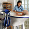 Shower chair - Alenti® - Arjo - with armrests / with cutout seat / with ...
