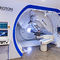 Proton therapy cyclotron with robotized positioning table - Sumitomo ...